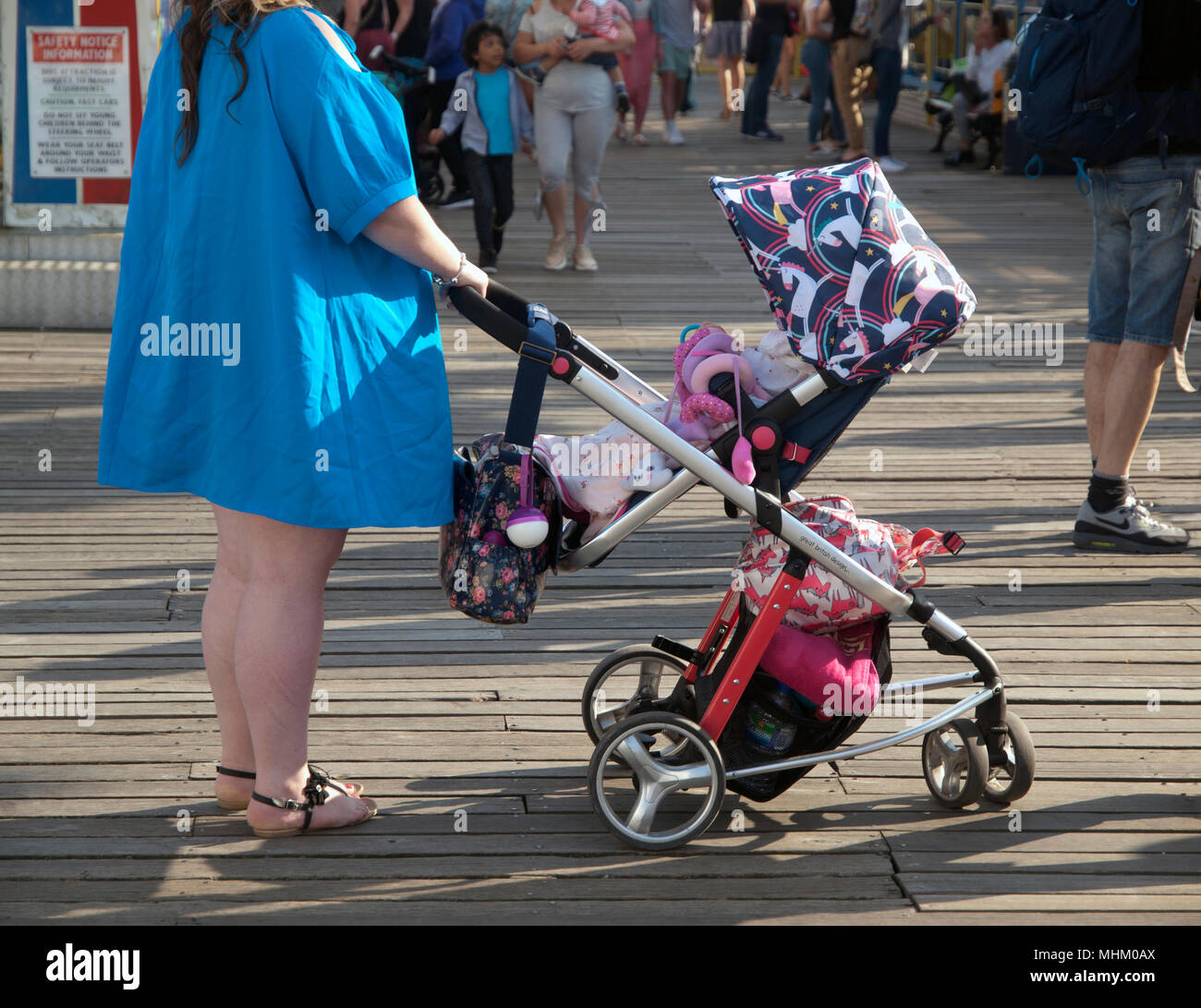 Baby in pushchair hi-res stock photography and images - Alamy
