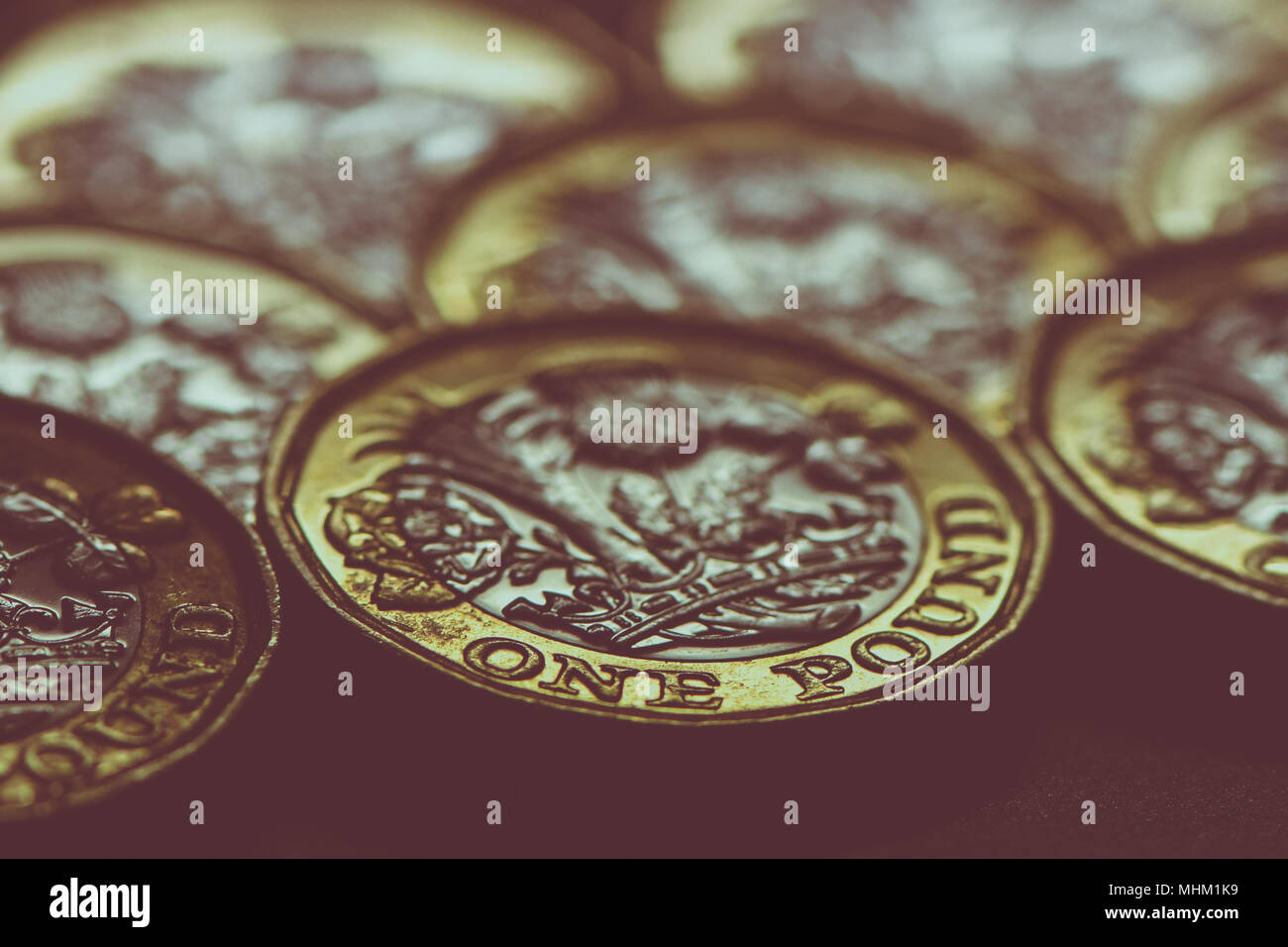 New pound coins currency lined up in pattern. Finance and business ...