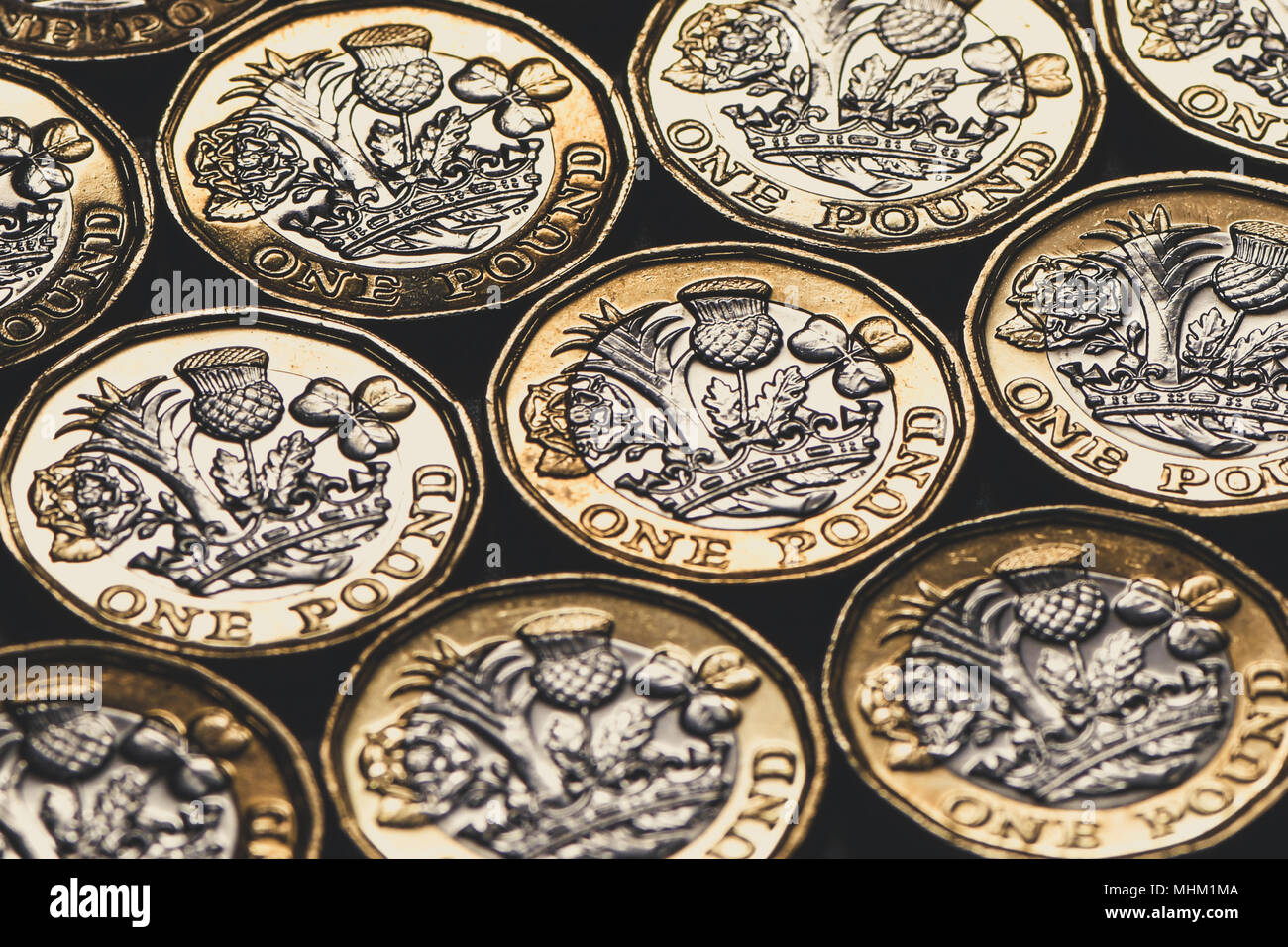 New pound coins currency lined up in pattern. Finance and business ...