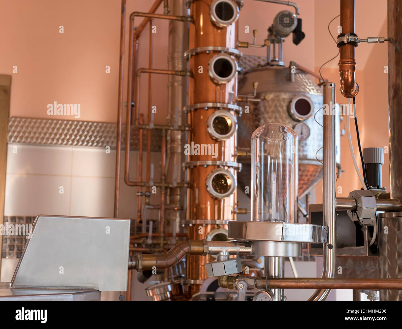 alembic still for making alcohol inside distillery, destilling spirits ...