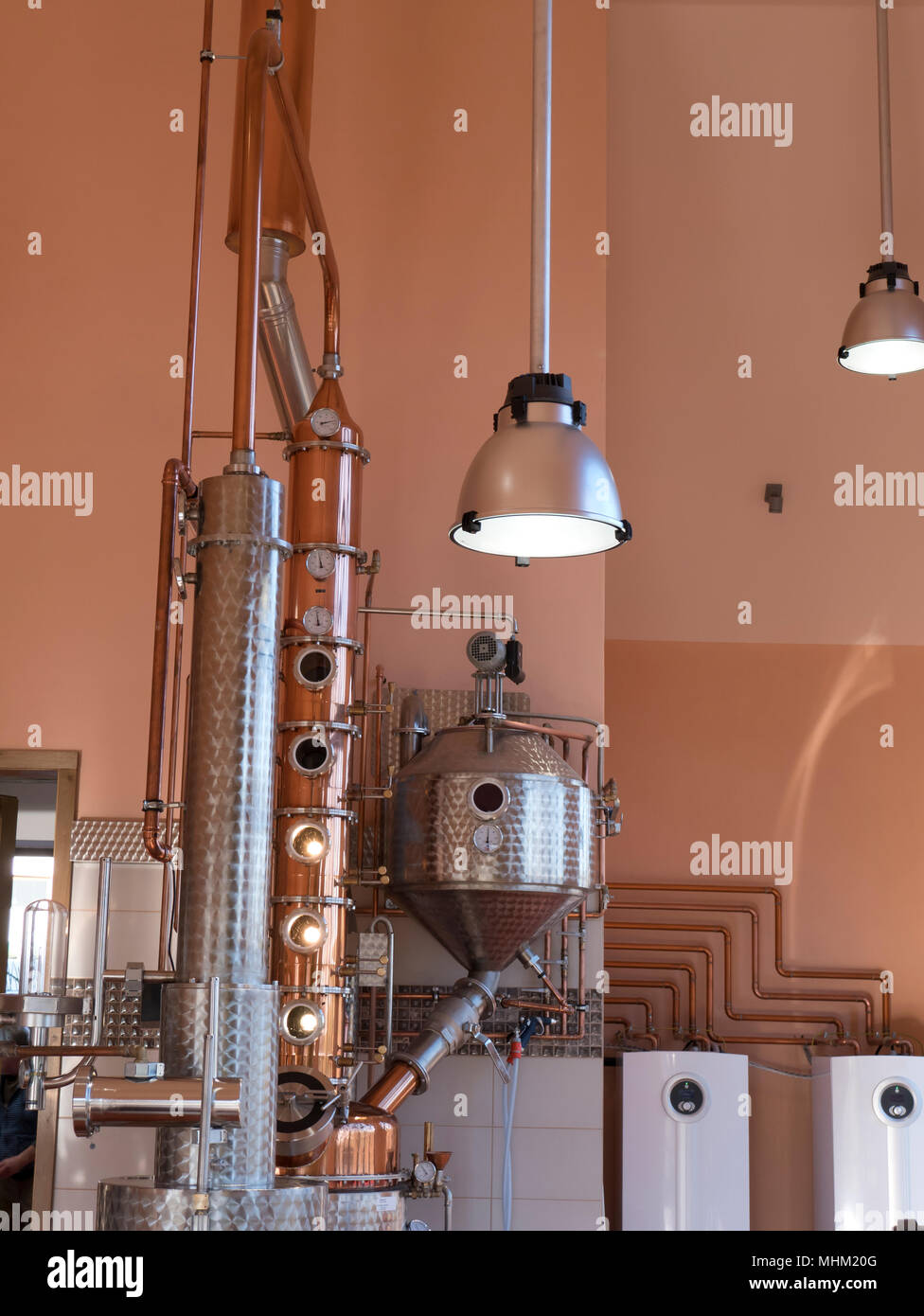 alembic still for making alcohol inside distillery, destilling spirits ...