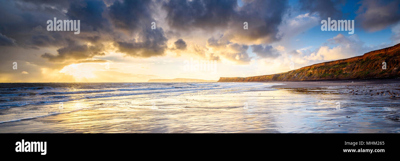 Seascape with a stormy sunset at Compton, Isle of Wight Stock Photo - Alamy