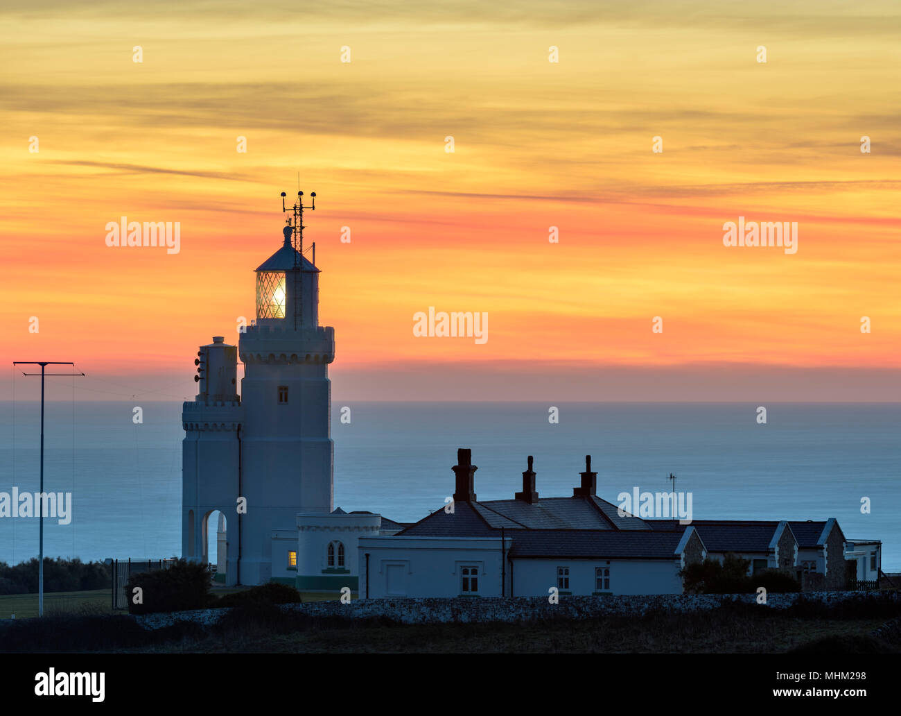 St Catherine's Lighthouse with a crescent moon Stock Photo - Alamy