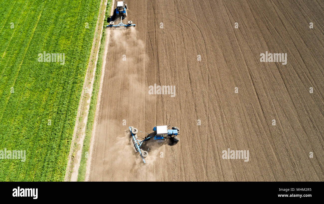 Two tractors on spring farm hi-res stock photography and images - Alamy