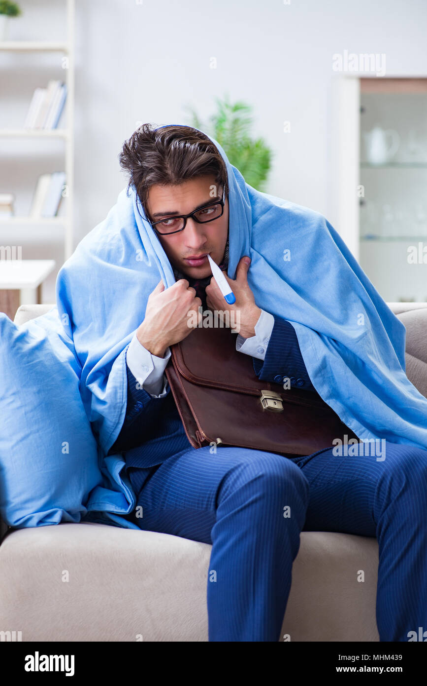 Sick employee staying at home suffering from flue Stock Photo - Alamy
