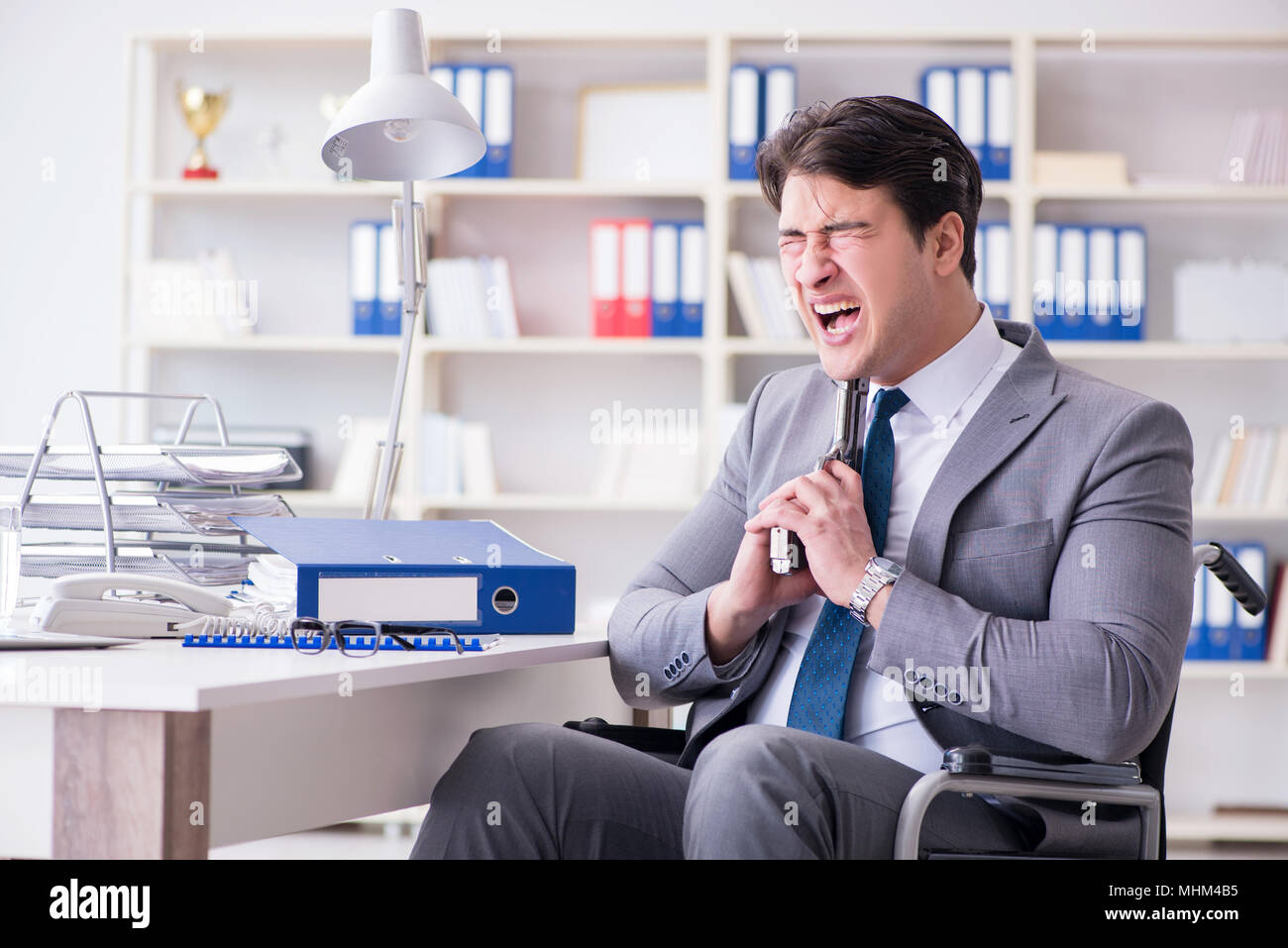 Disabled businessman on wheelchair in disability concept Stock Photo ...