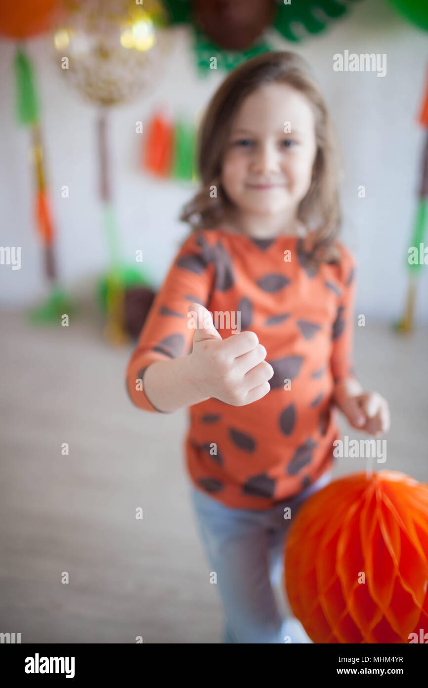 Girl lying shows class. Holiday decoration. Close-up Stock Photo - Alamy