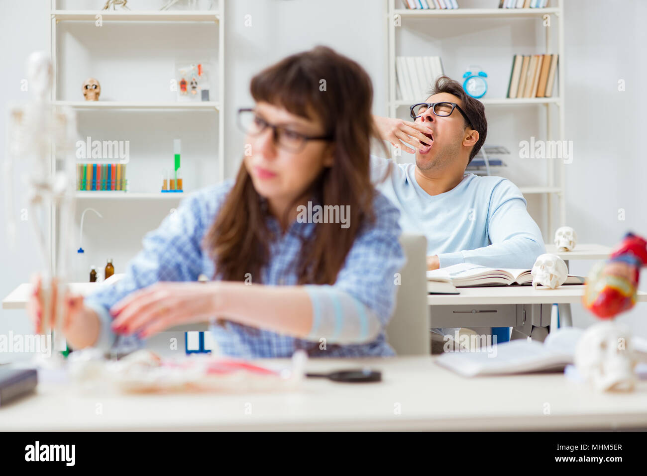 Two medical students studying in classroom Stock Photo - Alamy