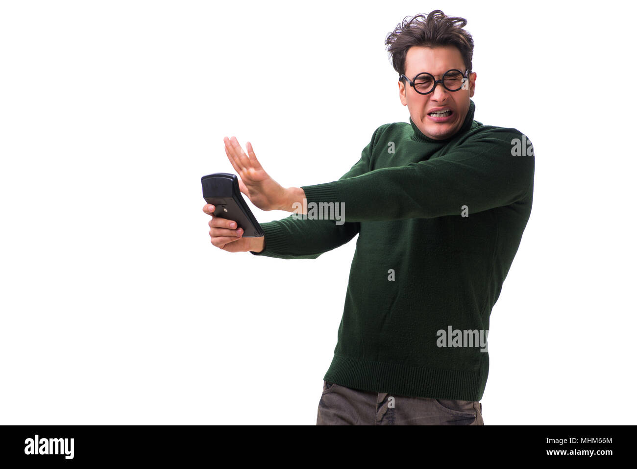 Nerd young man with calculator isolated on white Stock Photo - Alamy