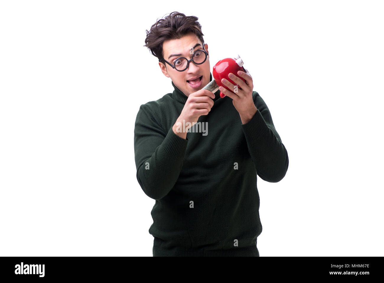 Nerd young man with piggybank isolated on white Stock Photo - Alamy