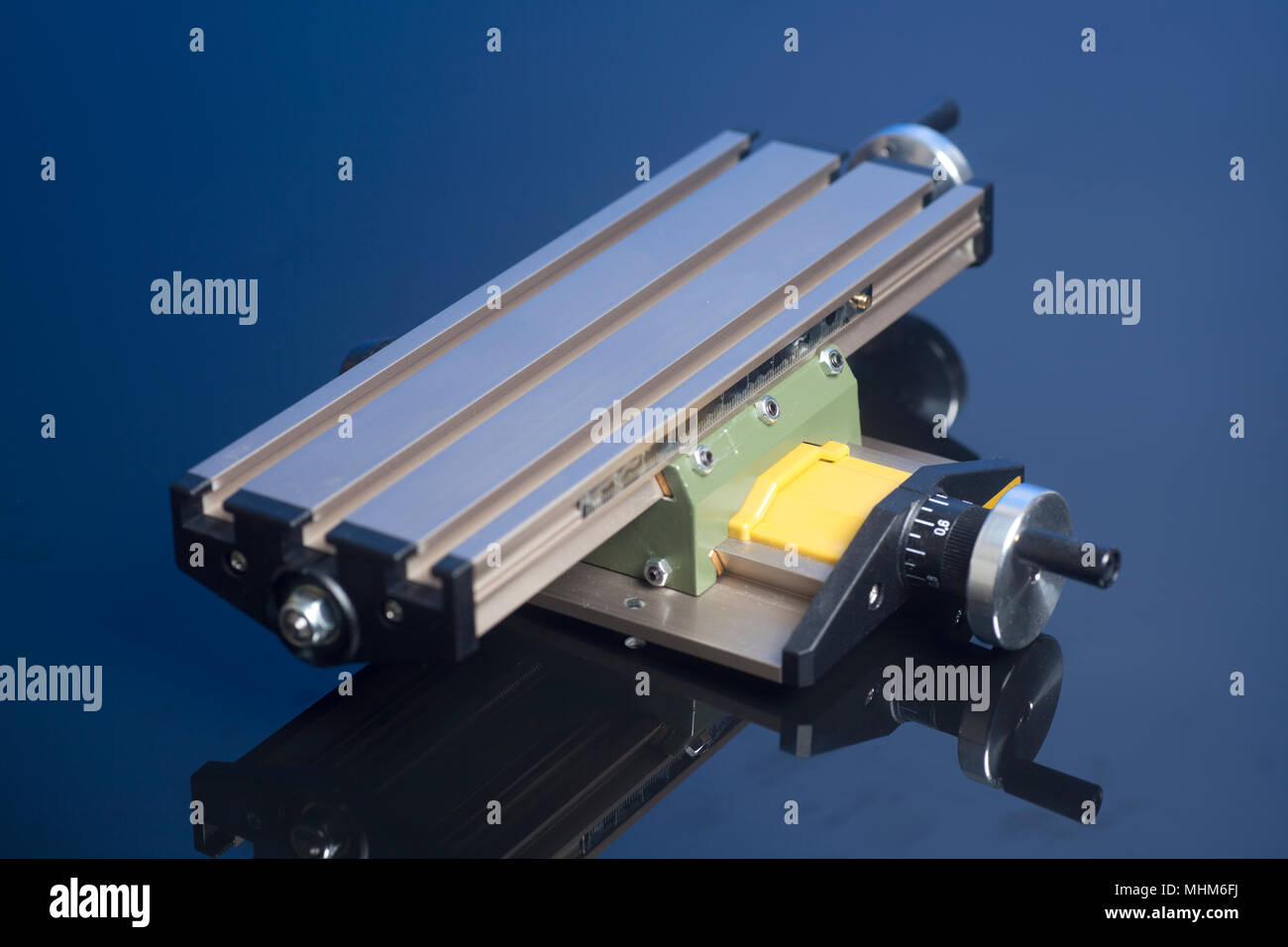 micro compound table on a blue background Stock Photo - Alamy