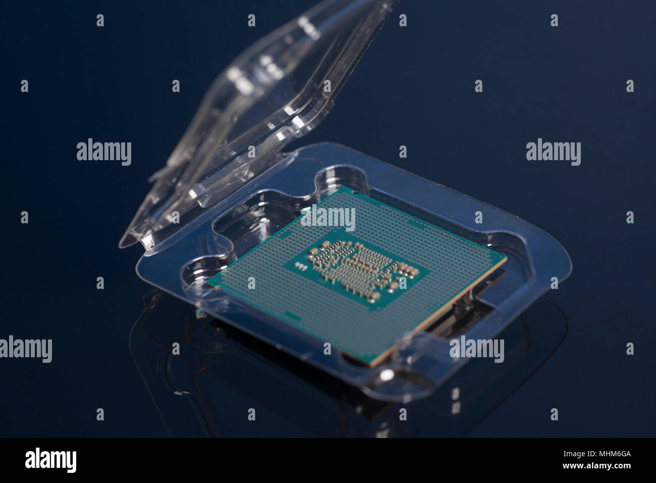 Central processing unit CPU processor microchip in the packaging box on ...