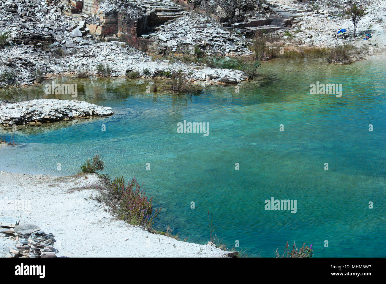 Abandoned quarry with blue lagoon Stock Photo - Alamy