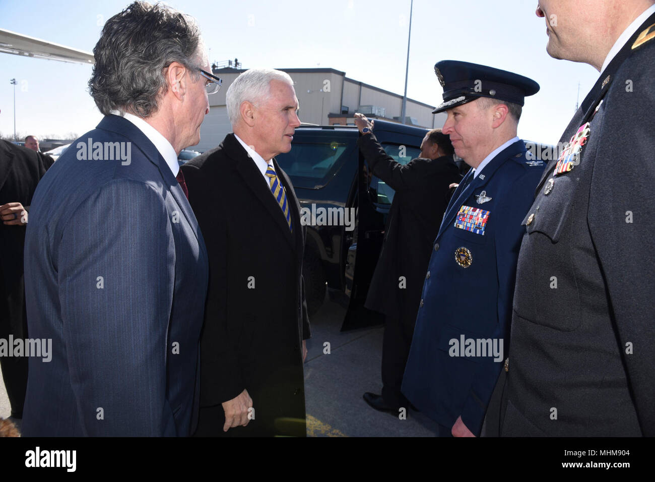 U.S. Vice President Mike Pence, second from left, is greeted by Col ...
