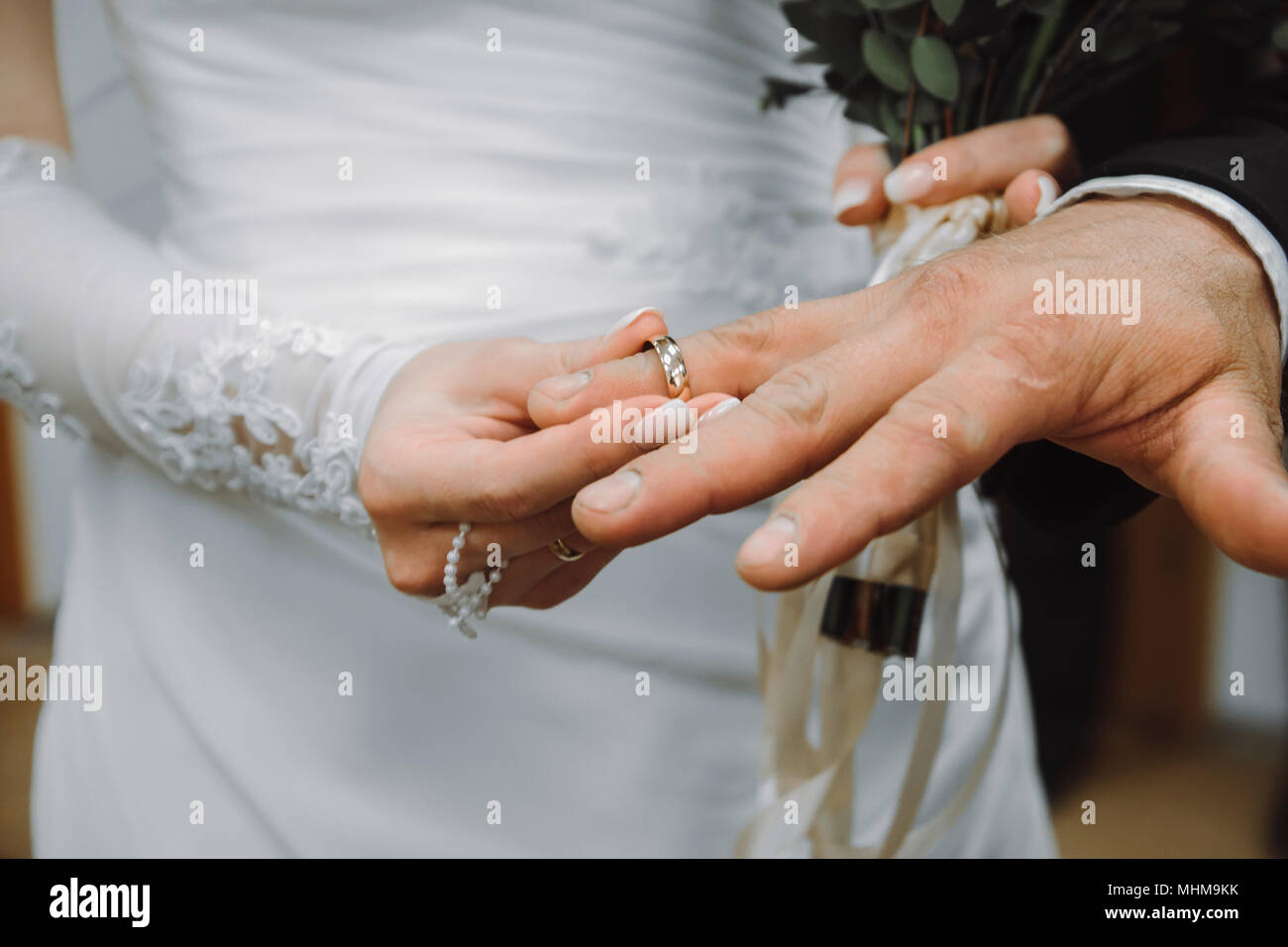 Dressing A Wedding Ring High Resolution Stock Photography and Images ...