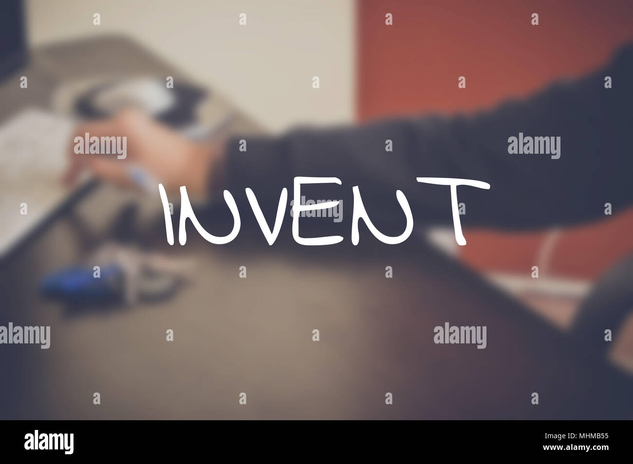 Invent word with business blurring background Stock Photo - Alamy