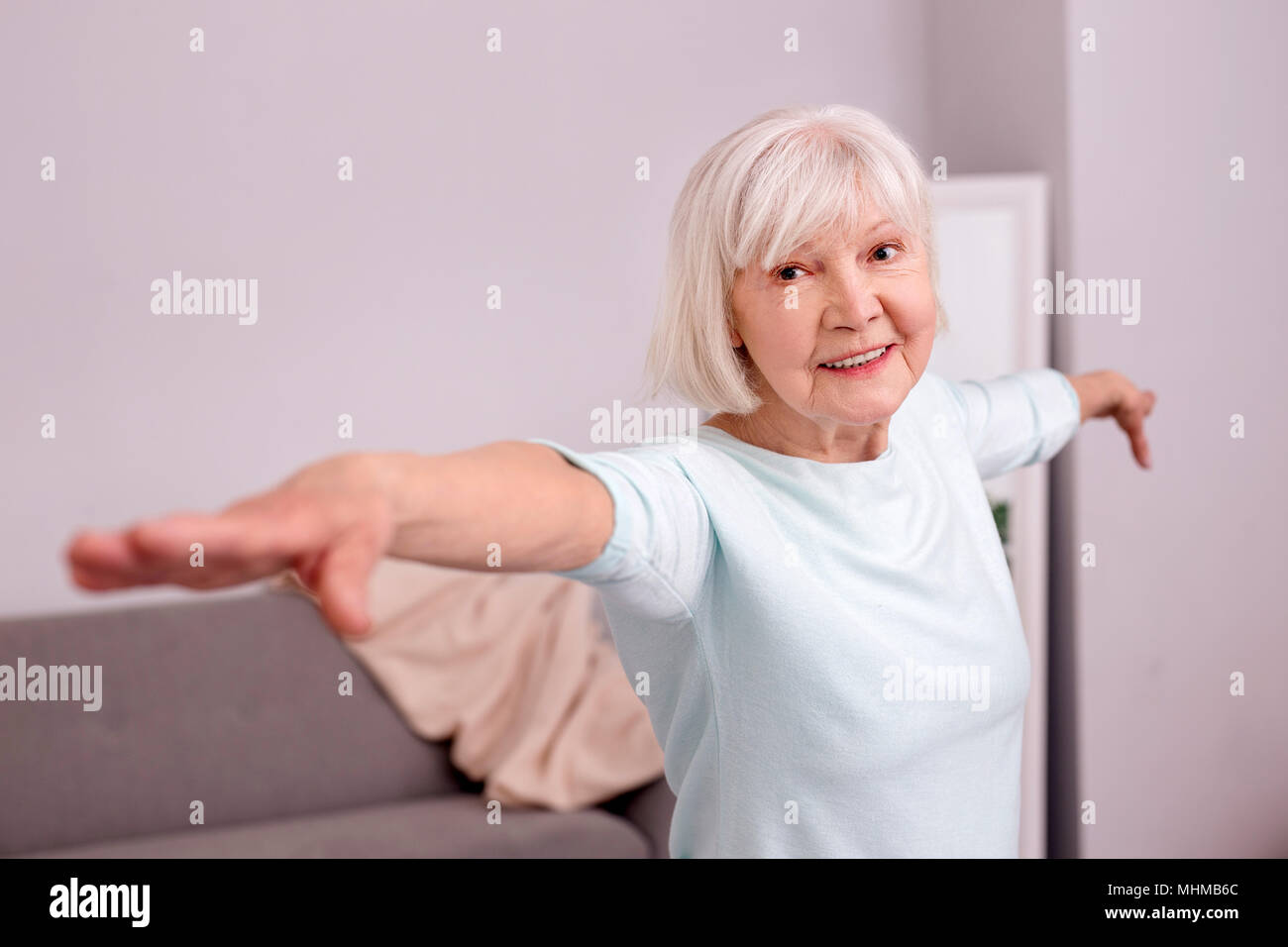Woman exercise arms wide hi-res stock photography and images - Alamy