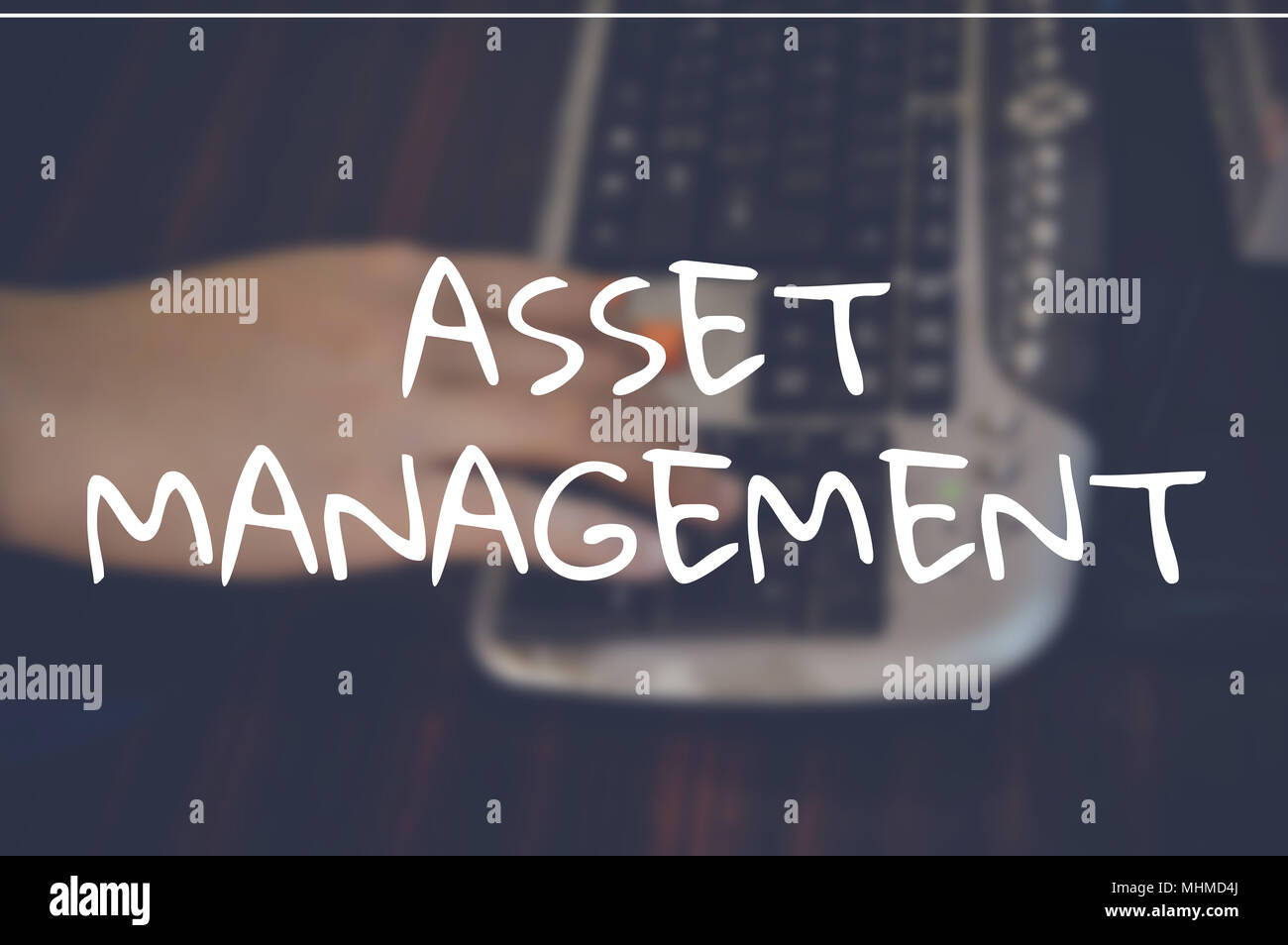 Asset management word with business blurring background Stock Photo - Alamy
