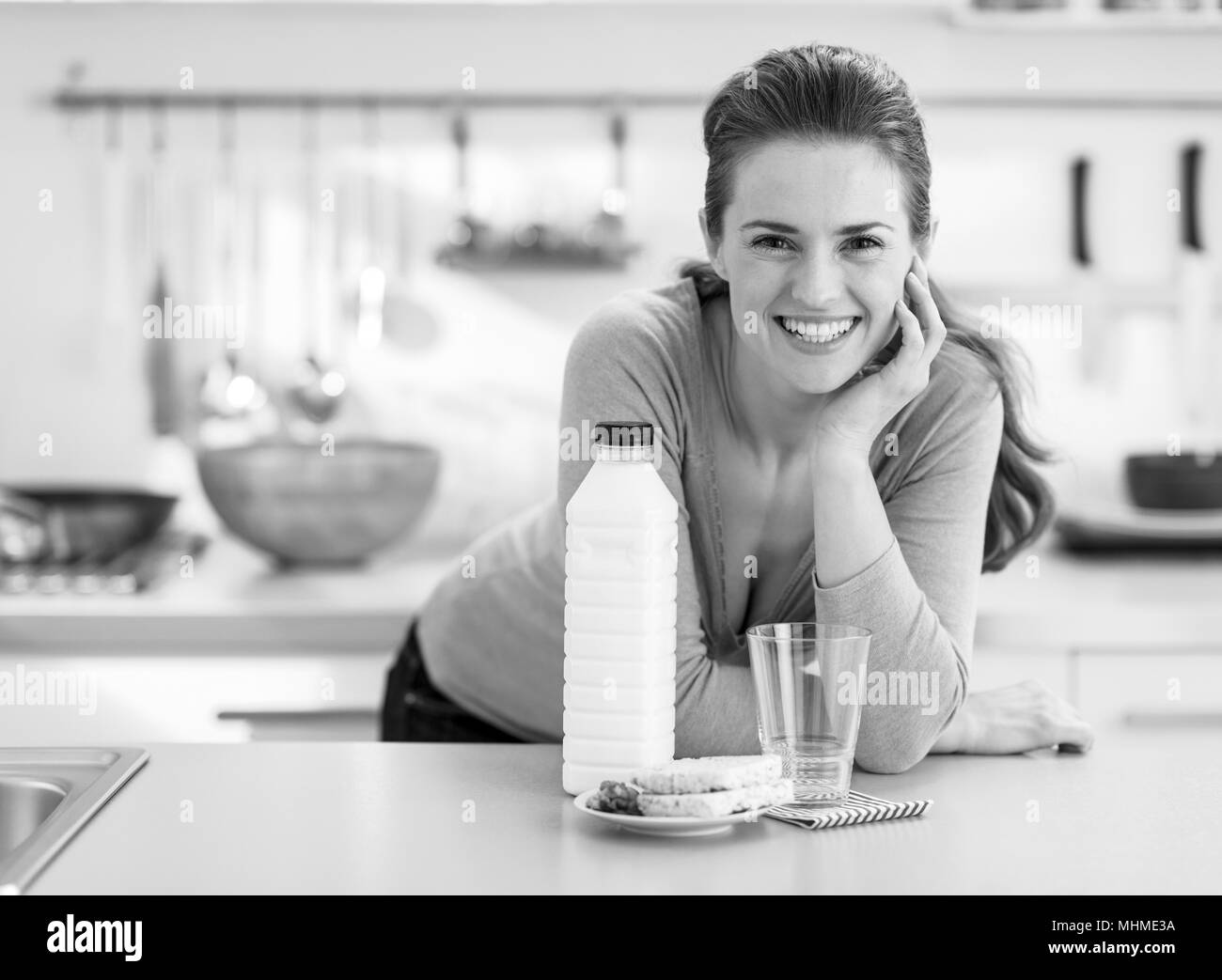 Portrait smiling woman eating Black and White Stock Photos & Images - Alamy