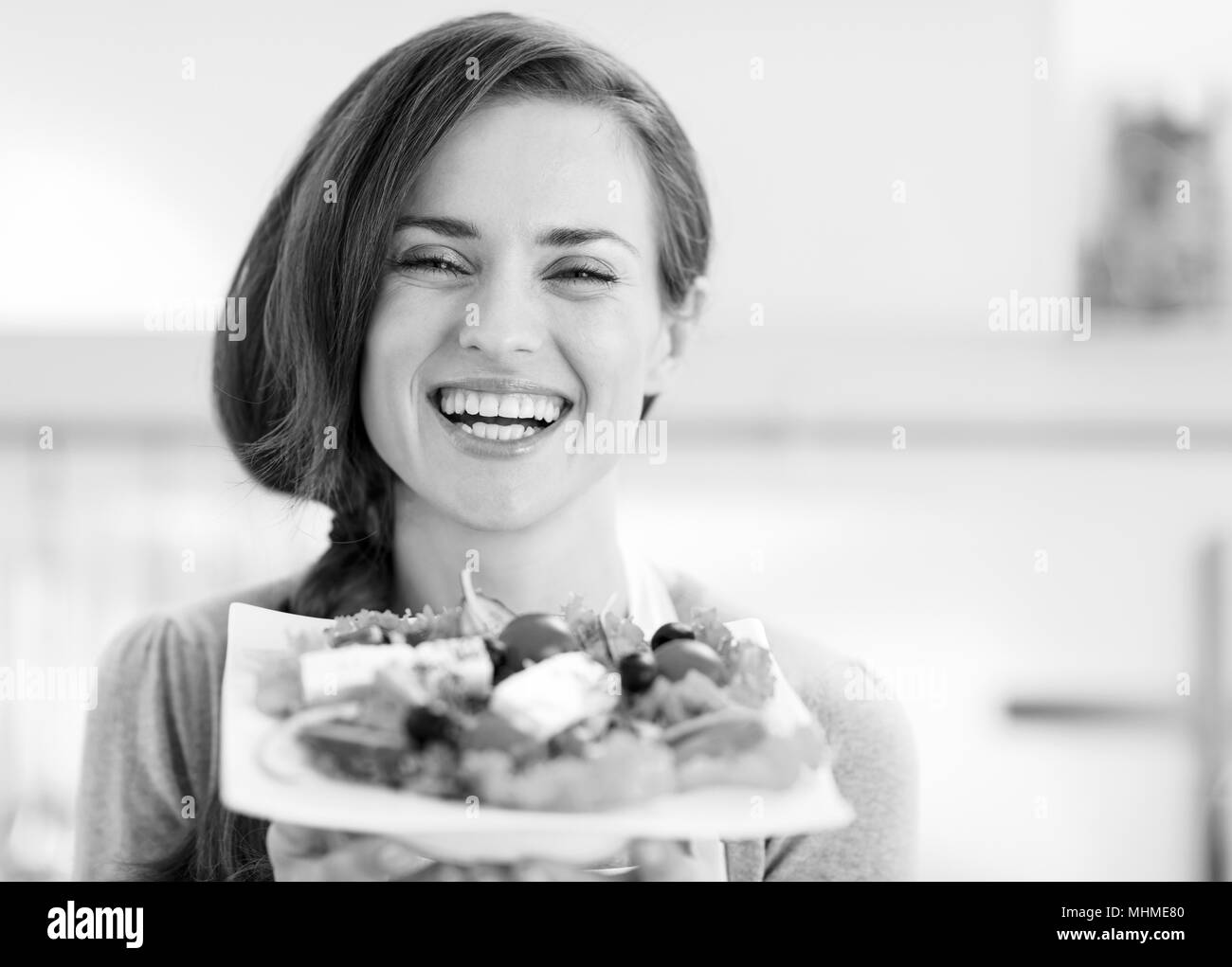 Young woman smiling salad Black and White Stock Photos & Images - Alamy