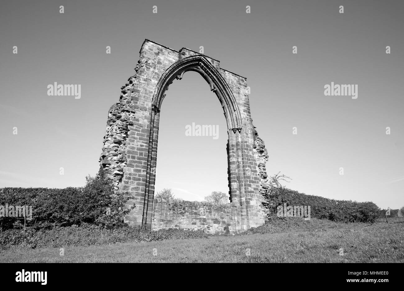 The ruined arched window frame at Dale Abbey, Derbyshire, UK Stock ...