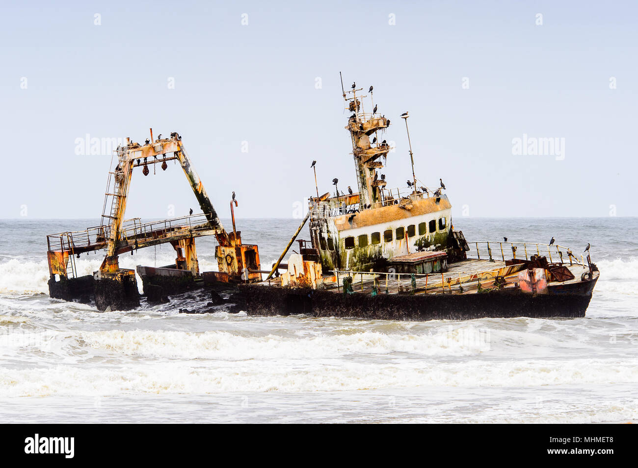 Damaged abandoned ship at the coastline of Namibia Stock Photo - Alamy