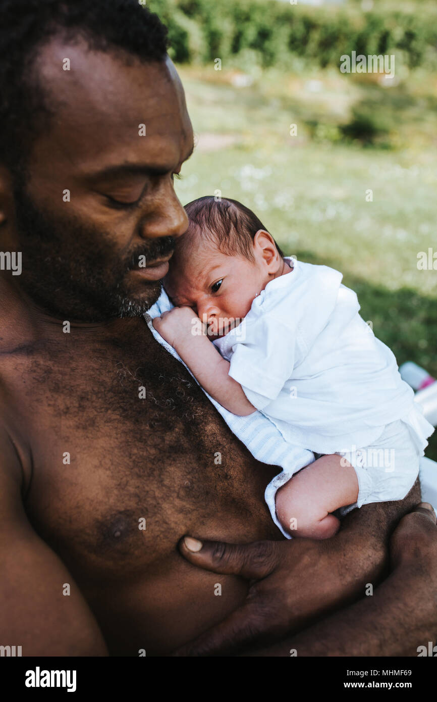 Black baby father sleeping hi-res stock photography and images - Alamy