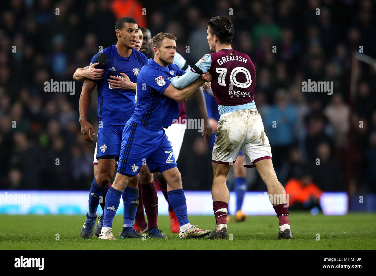 Cardiff City's Jamie Ward (left) exchanges word with Aston Villa's Jack ...