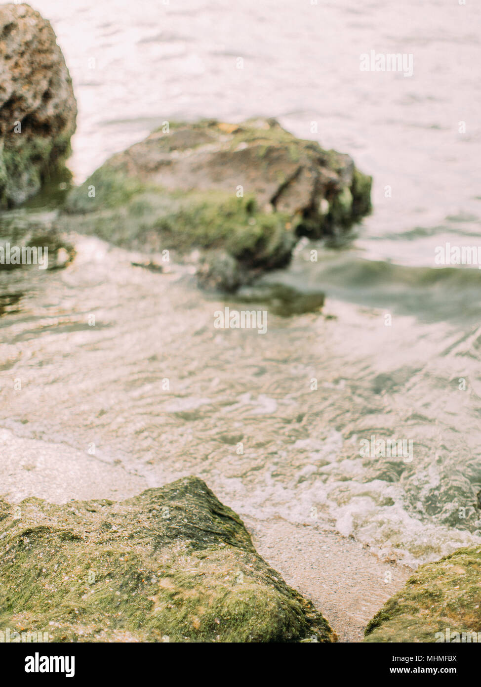 The composition of the seascape. The stones are washed by the sea Stock ...