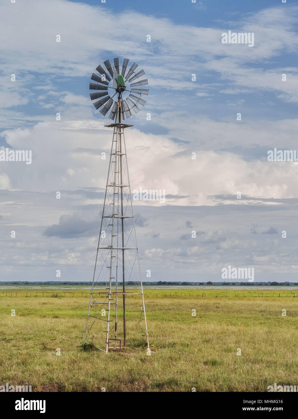 Wind turbine standing alone in the floodplains of the river Stock Photo ...
