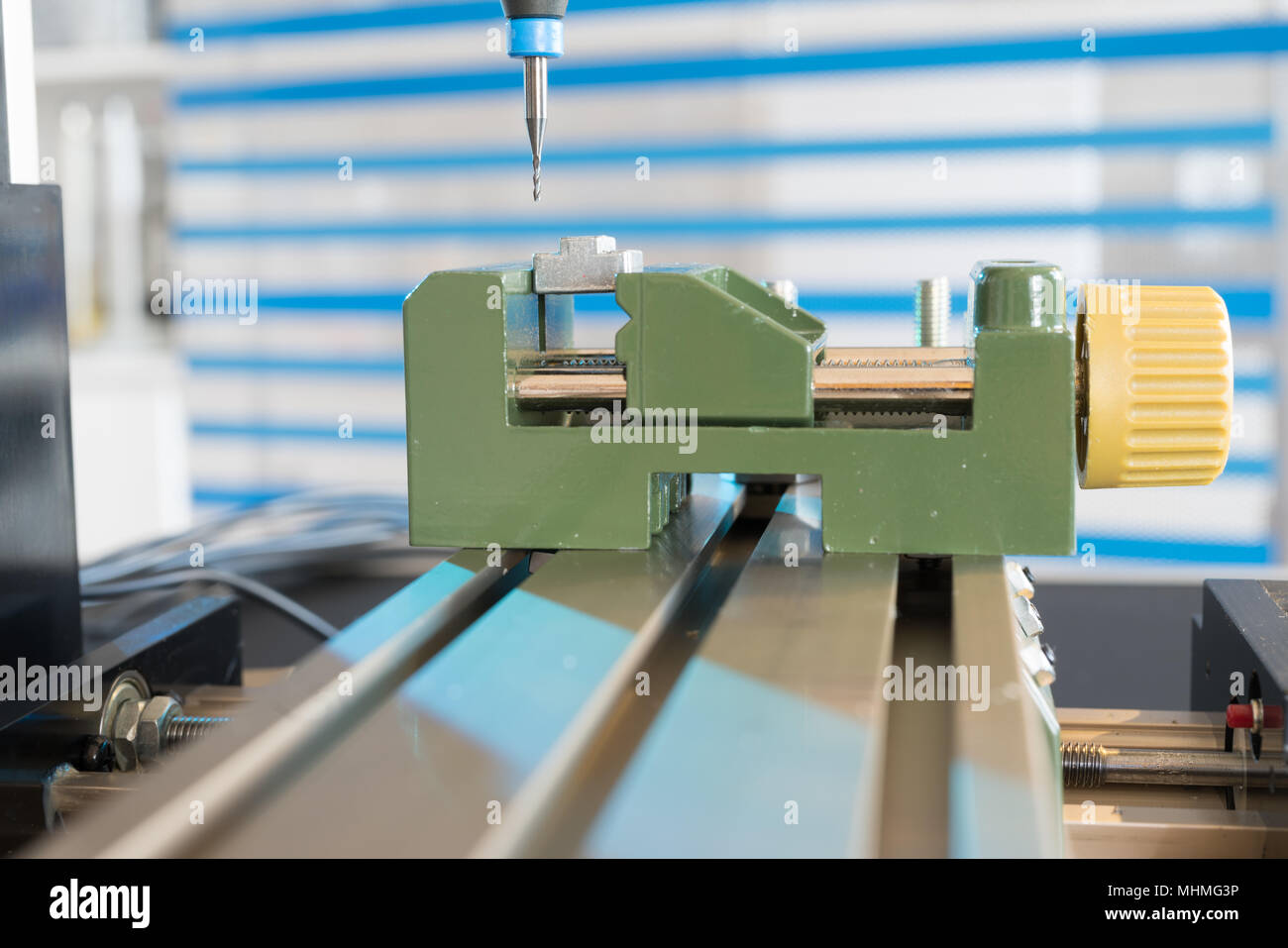 CNC milling machine processing plastic detail.Cutting plastic modern ...