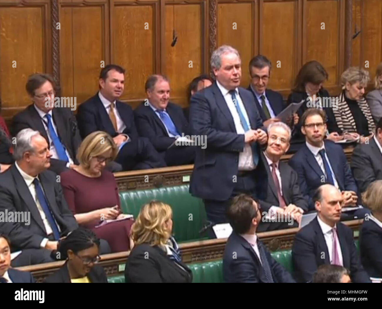 Former Home Secretary Amber Rudd on the back benches sitting next to a ...