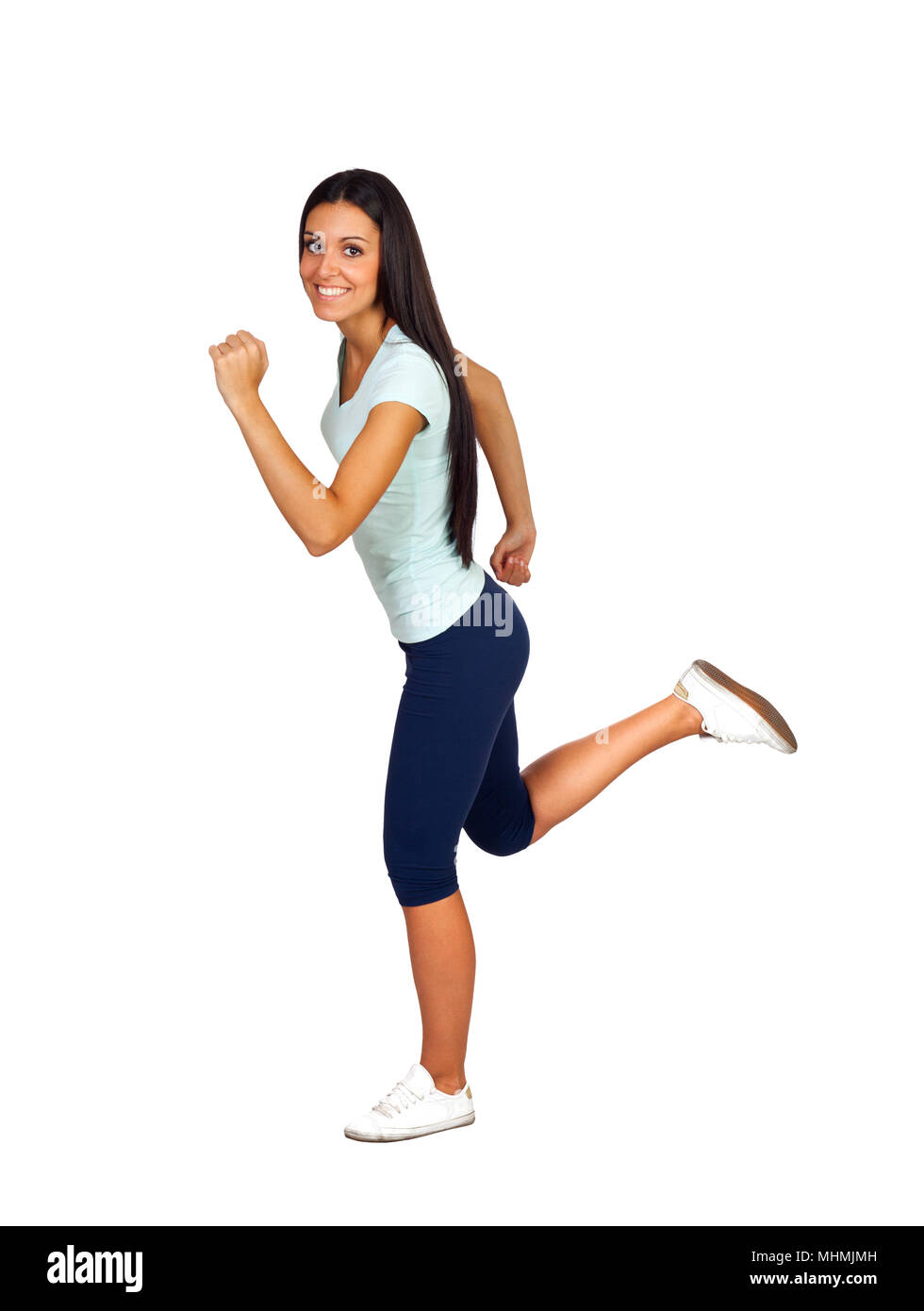 Brunette woman with long hair running isolated on a white background ...