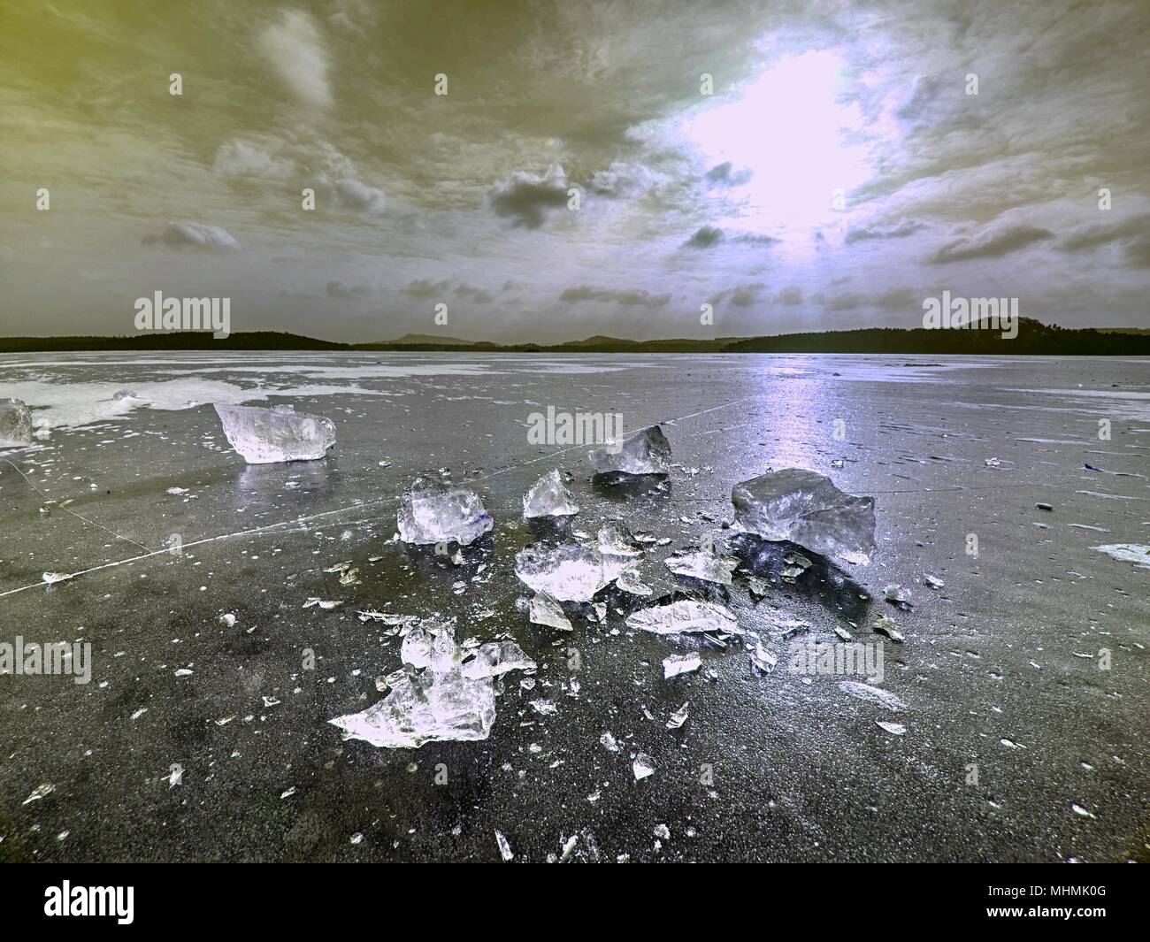 Shining broken ice. Abstract still life of ice floes. Wind, temperature ...