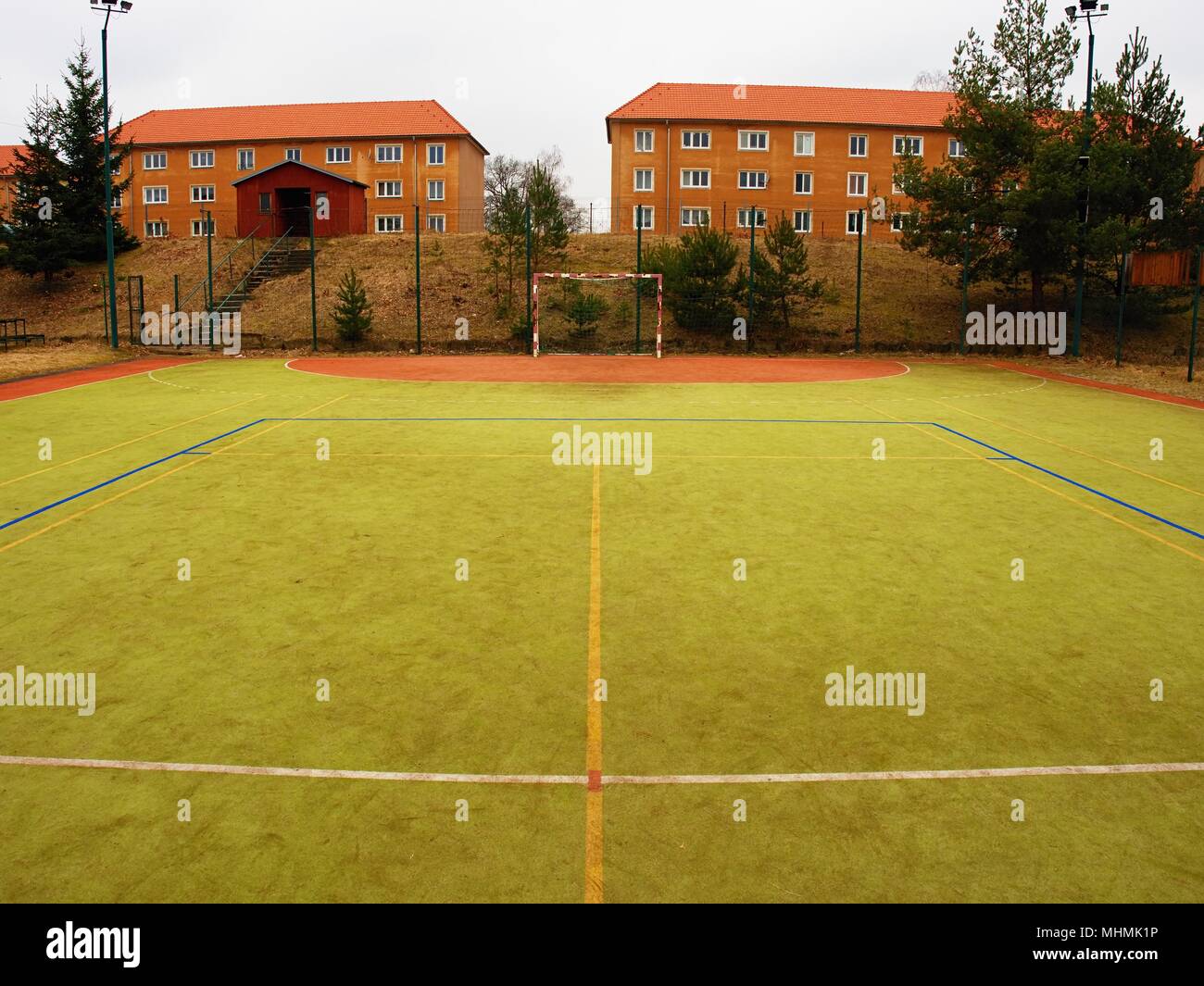 On the football field without goal keeper. Outdoor turf play field. Old ...