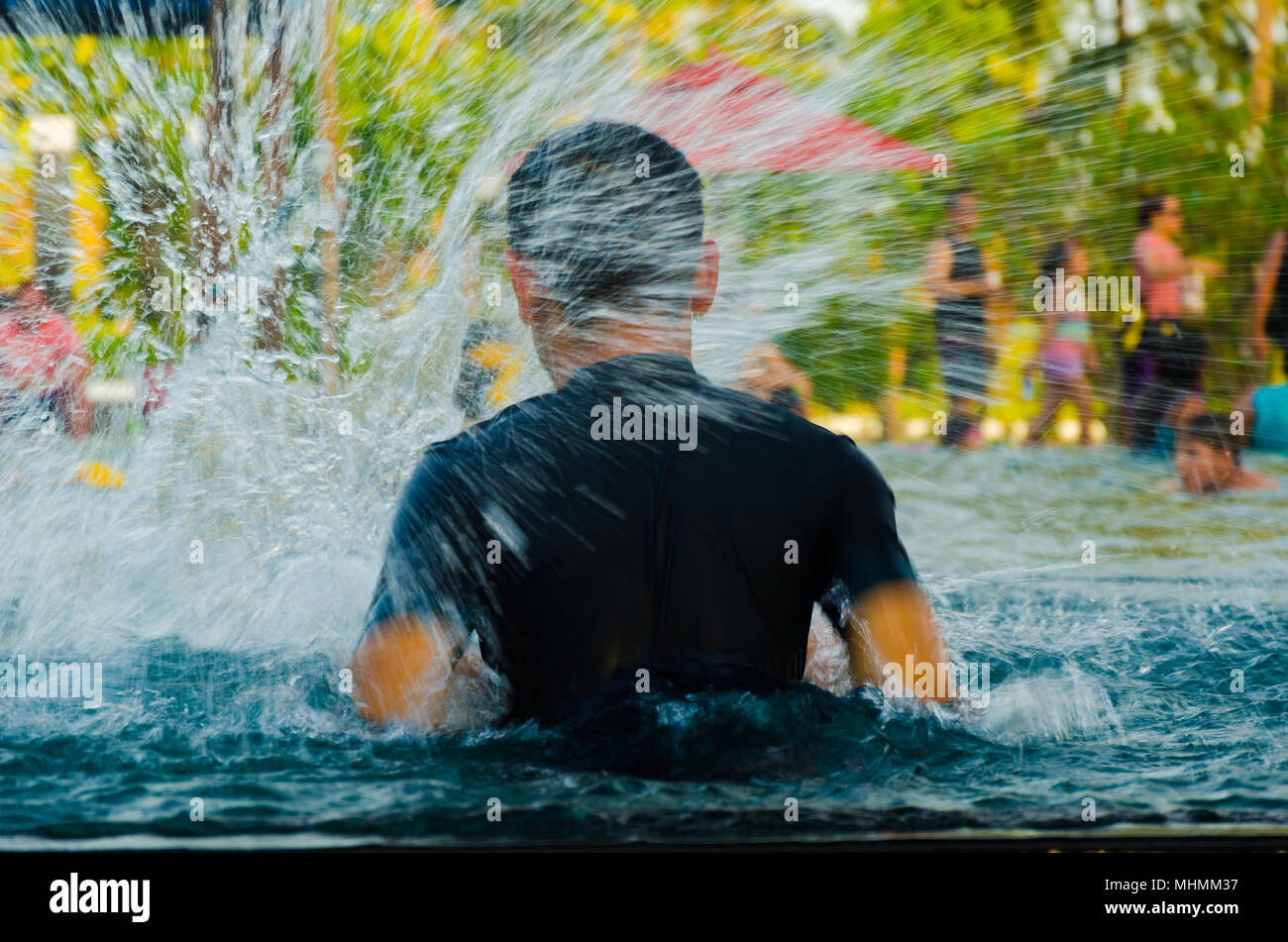 Water splash in swimming pool Stock Photo - Alamy