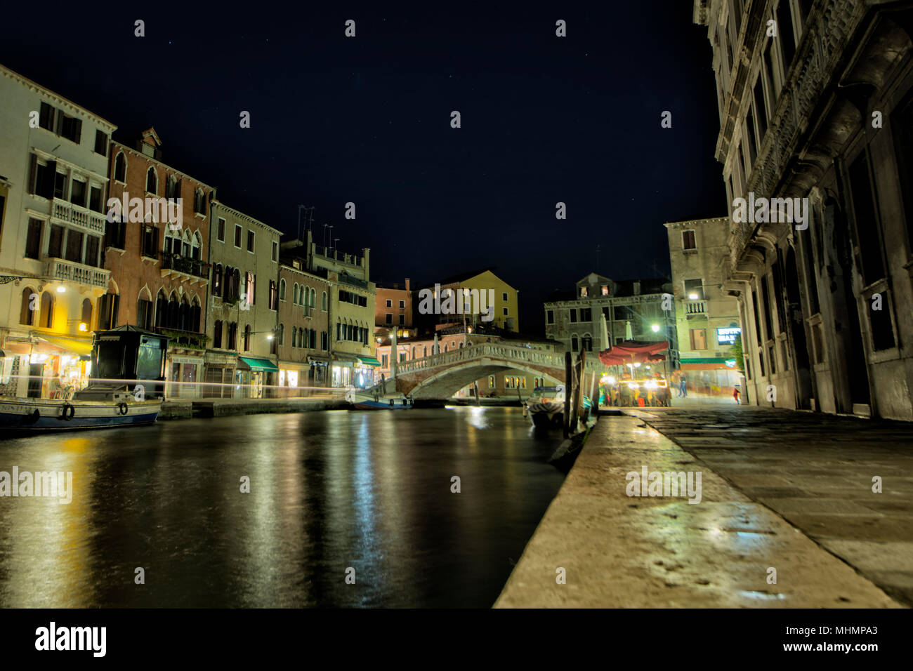 venice canals night view with light reflections Stock Photo - Alamy