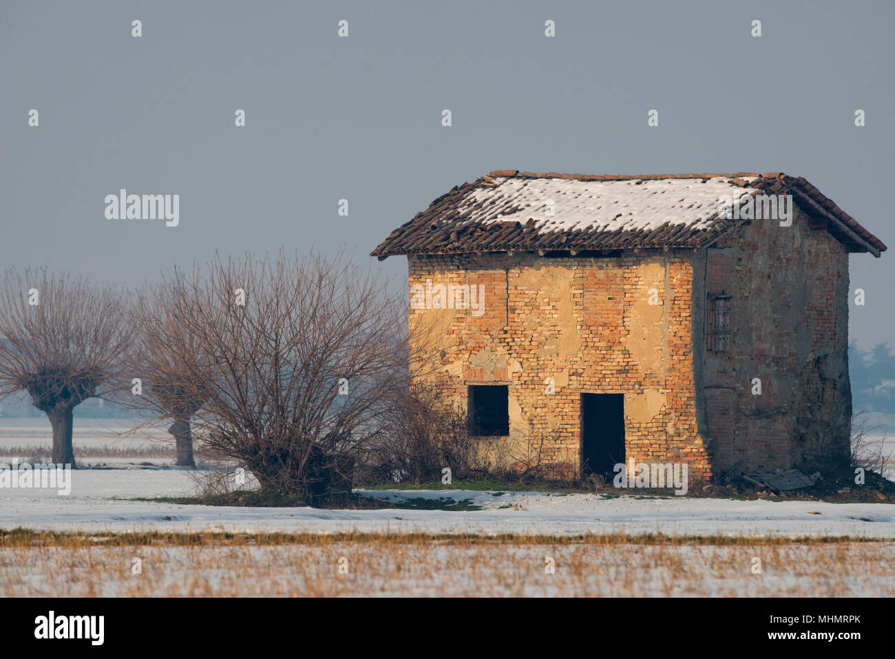 Old brick house covered by snow Stock Photo - Alamy