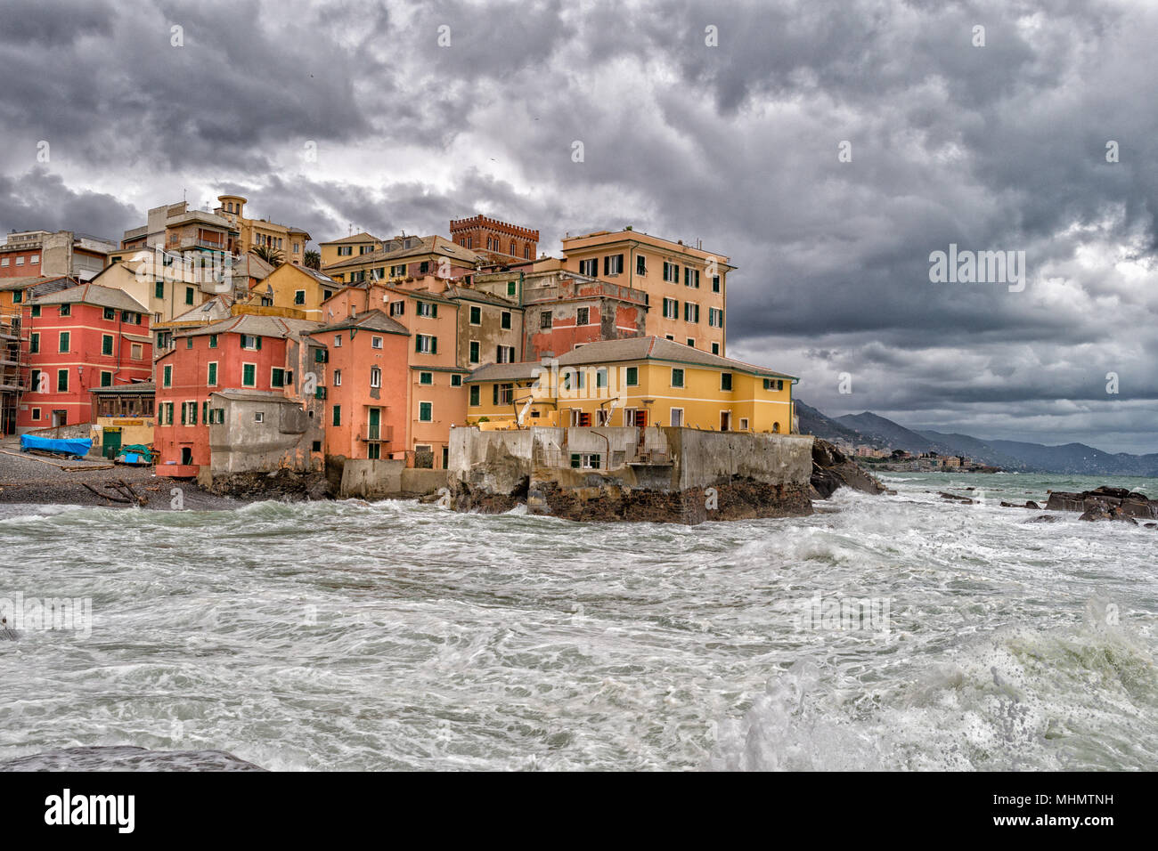 sea in tempest on rocks with splashes Stock Photo - Alamy