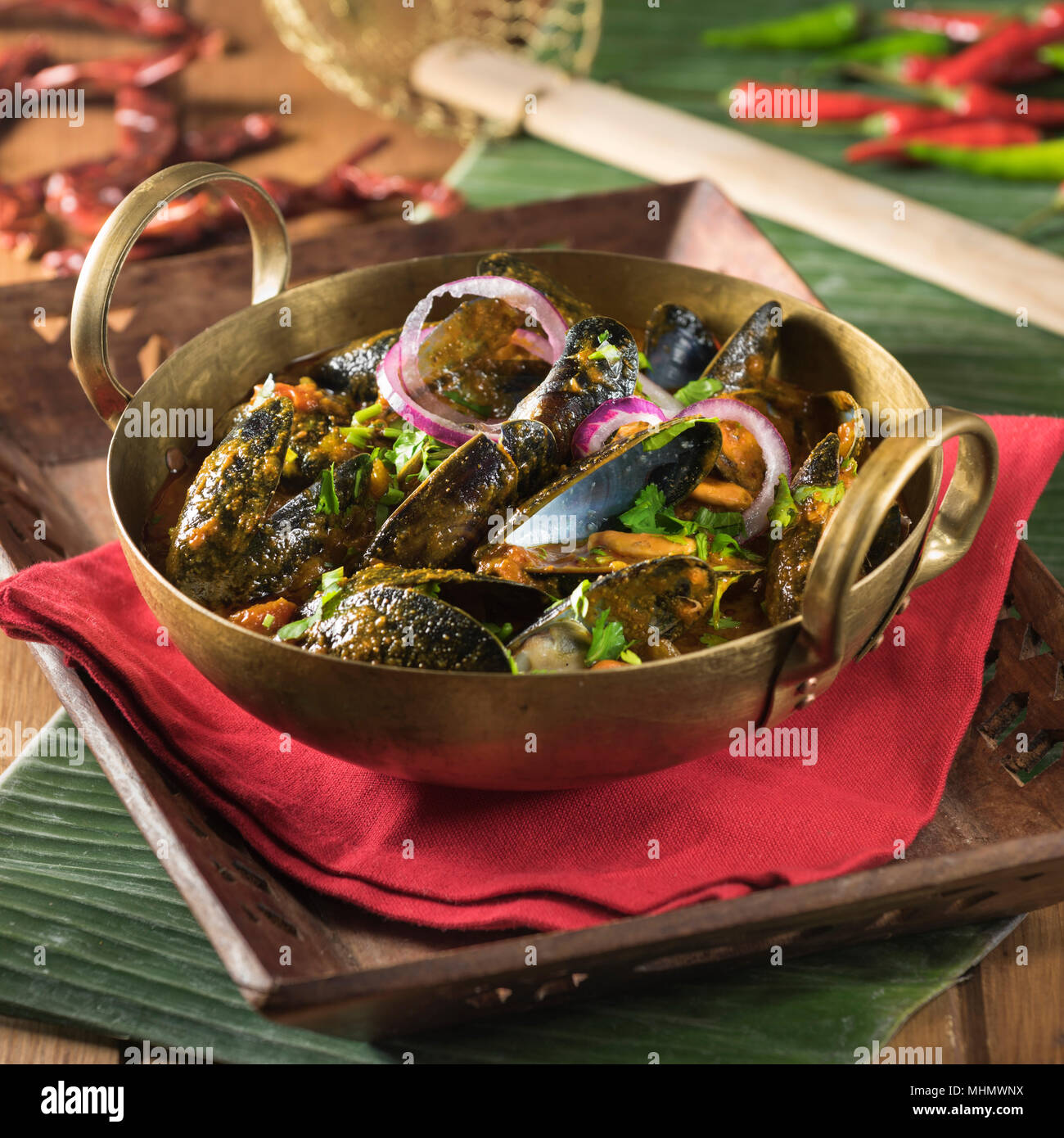 Mussels masala. Shellfish curry. India Food Stock Photo - Alamy