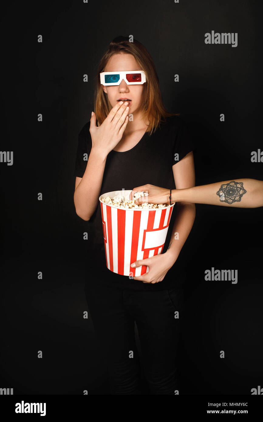 shocked woman in cinema Stock Photo - Alamy