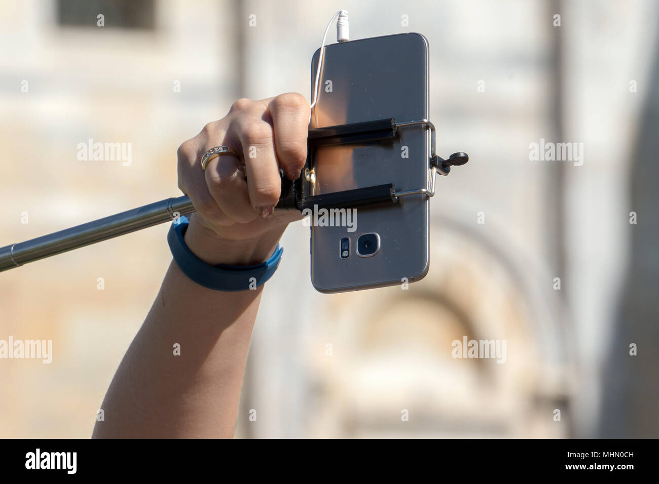 hand taking picture with smartphone on soft color background Stock ...
