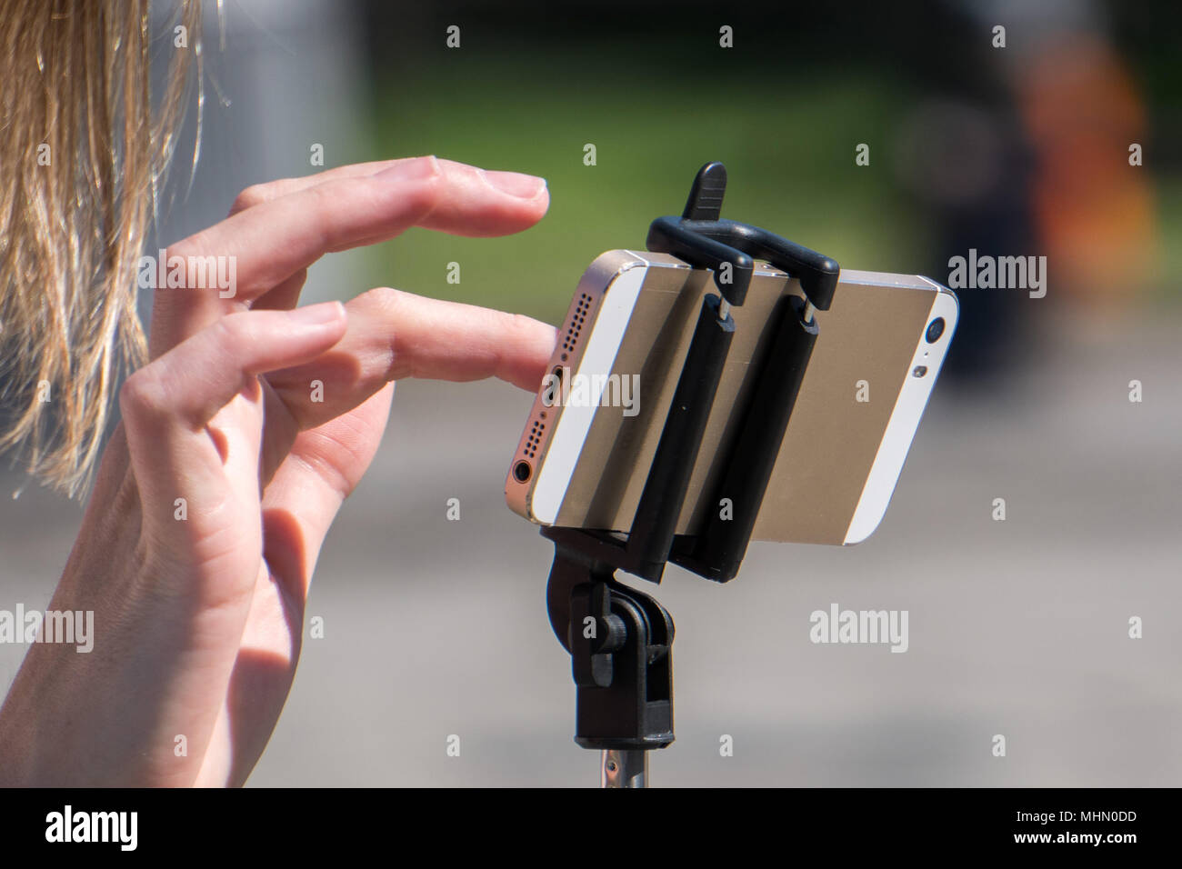 hand taking picture with smartphone on soft color background Stock ...