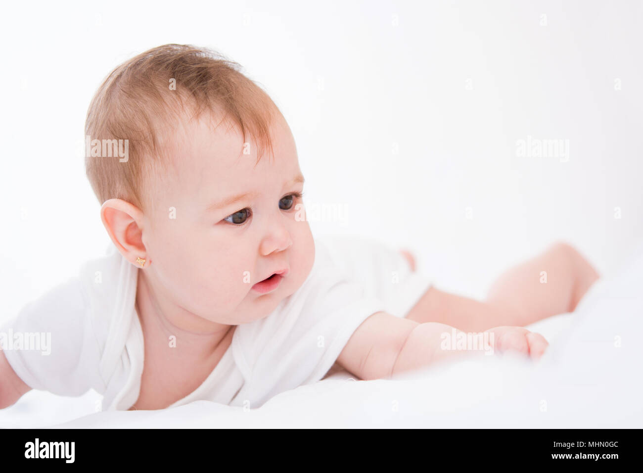 Adorable little baby girl on white background Stock Photo - Alamy