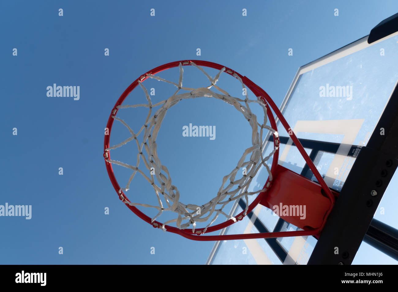 Basketball hoop photographed from below on a beautiful summer day Stock ...