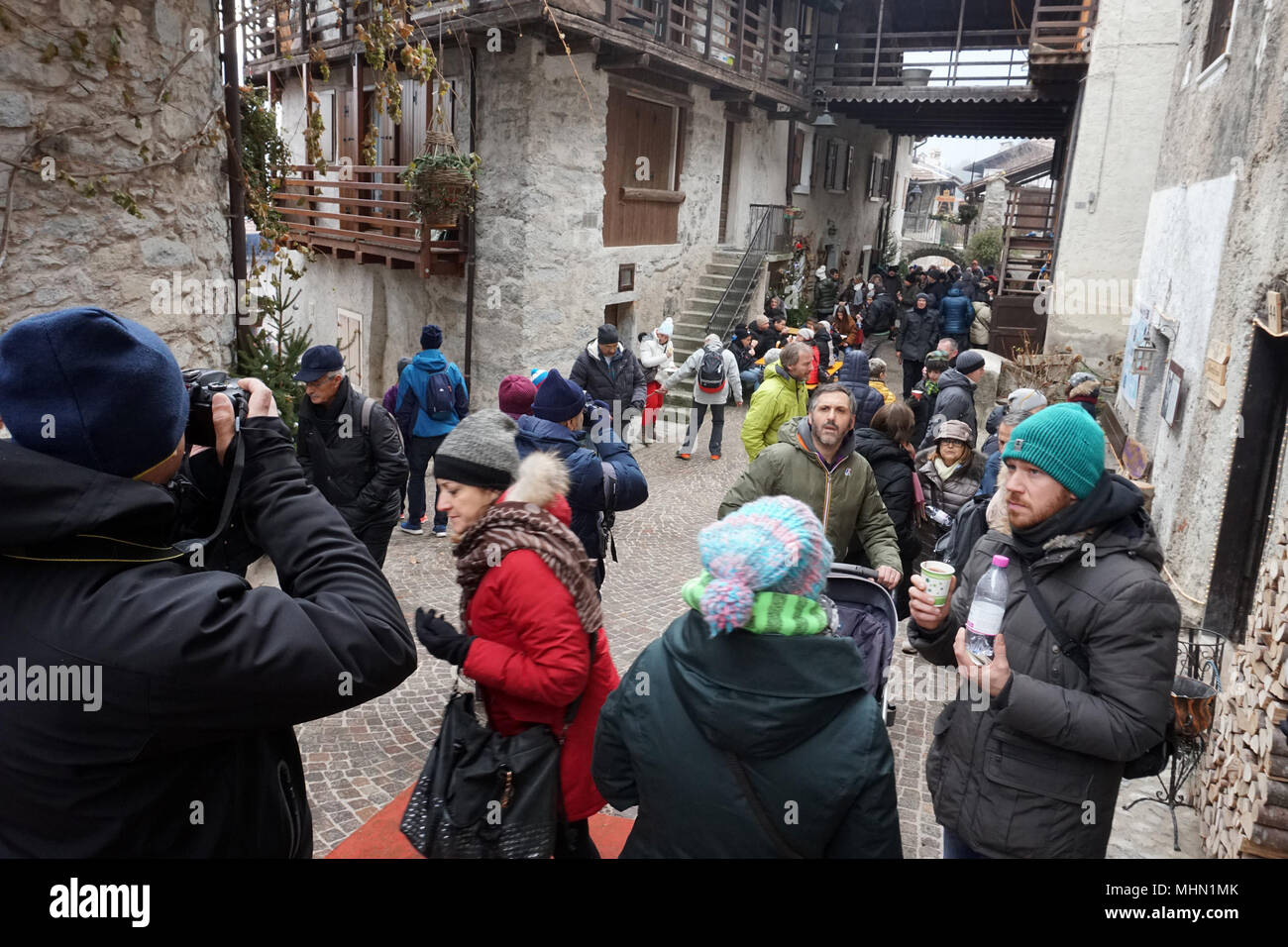 RANGO, ITALY - DECEMBER 1, 2017 - People buying at the shops of ...