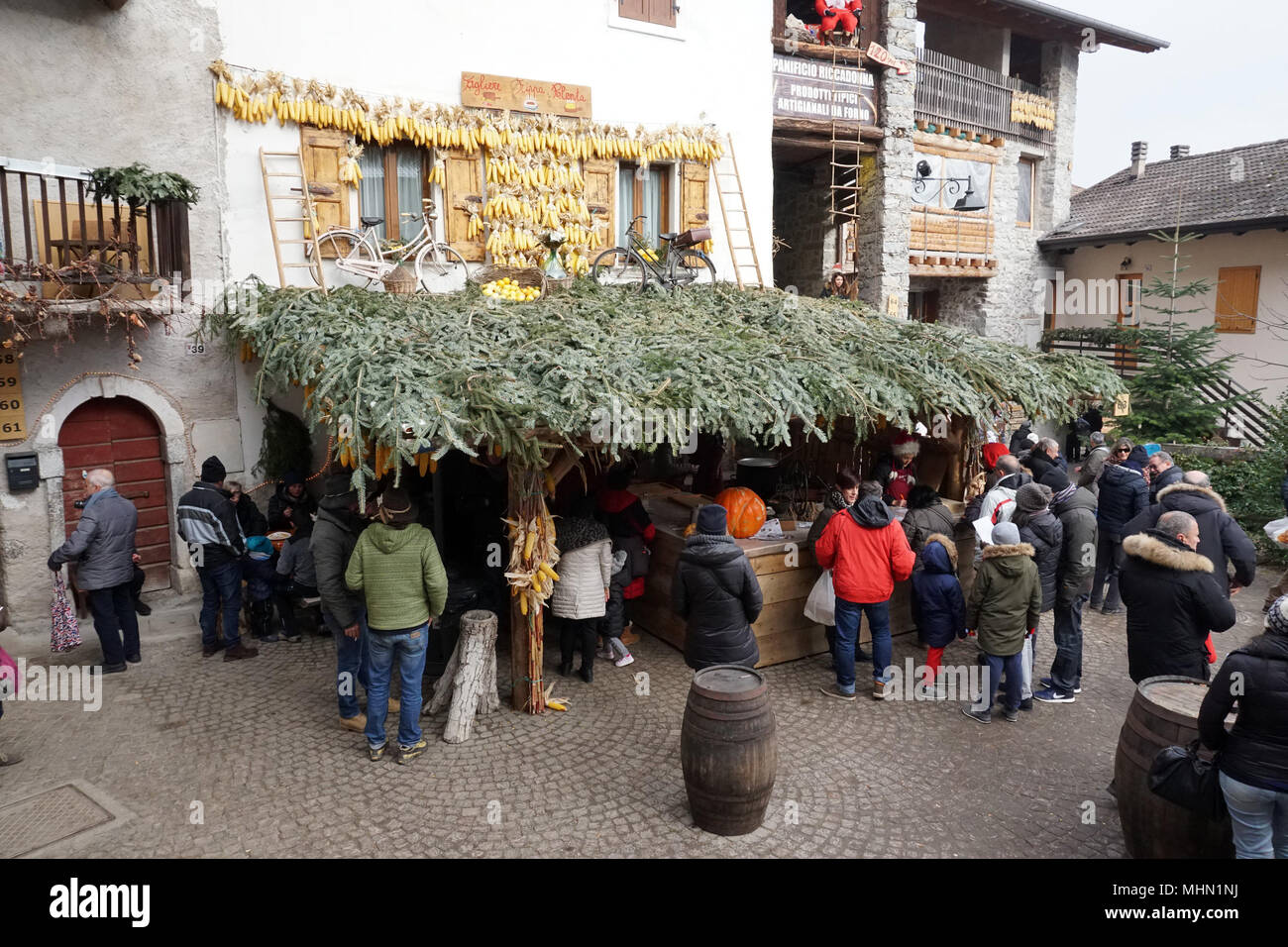 RANGO, ITALY - DECEMBER 1, 2017 - People buying at the shops of ...