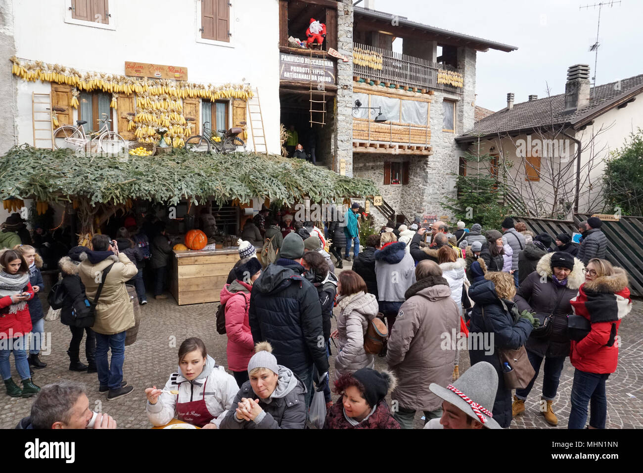 RANGO, ITALY - DECEMBER 1, 2017 - People buying at the shops of ...