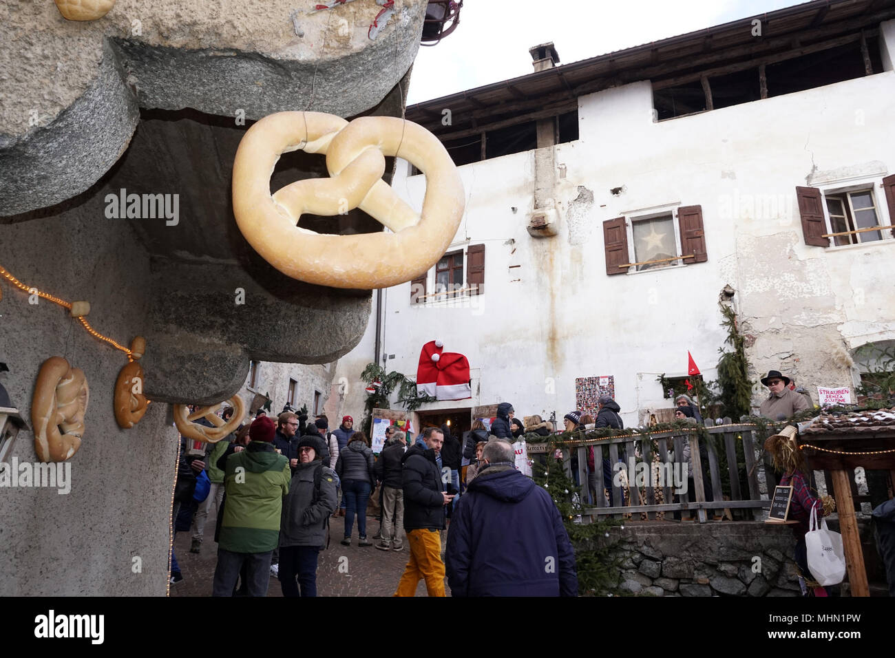 RANGO, ITALY - DECEMBER 1, 2017 - People buying at the shops of ...