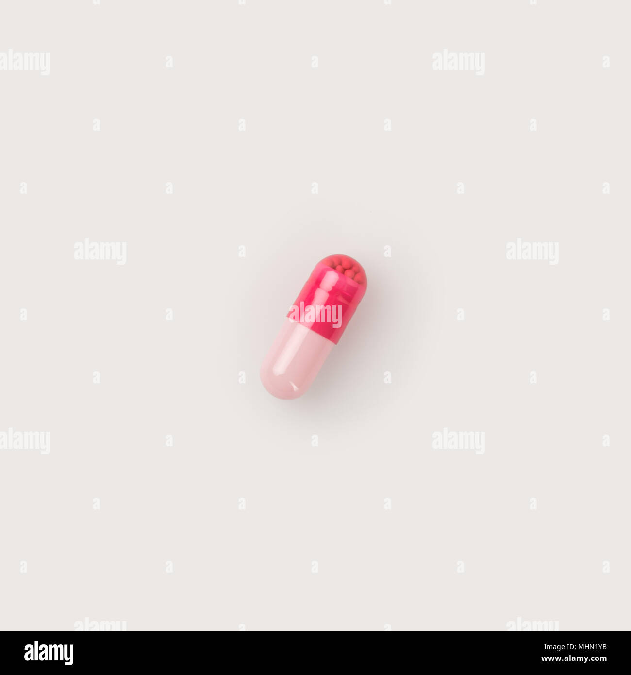 Pink pill hi-res stock photography and images - Alamy